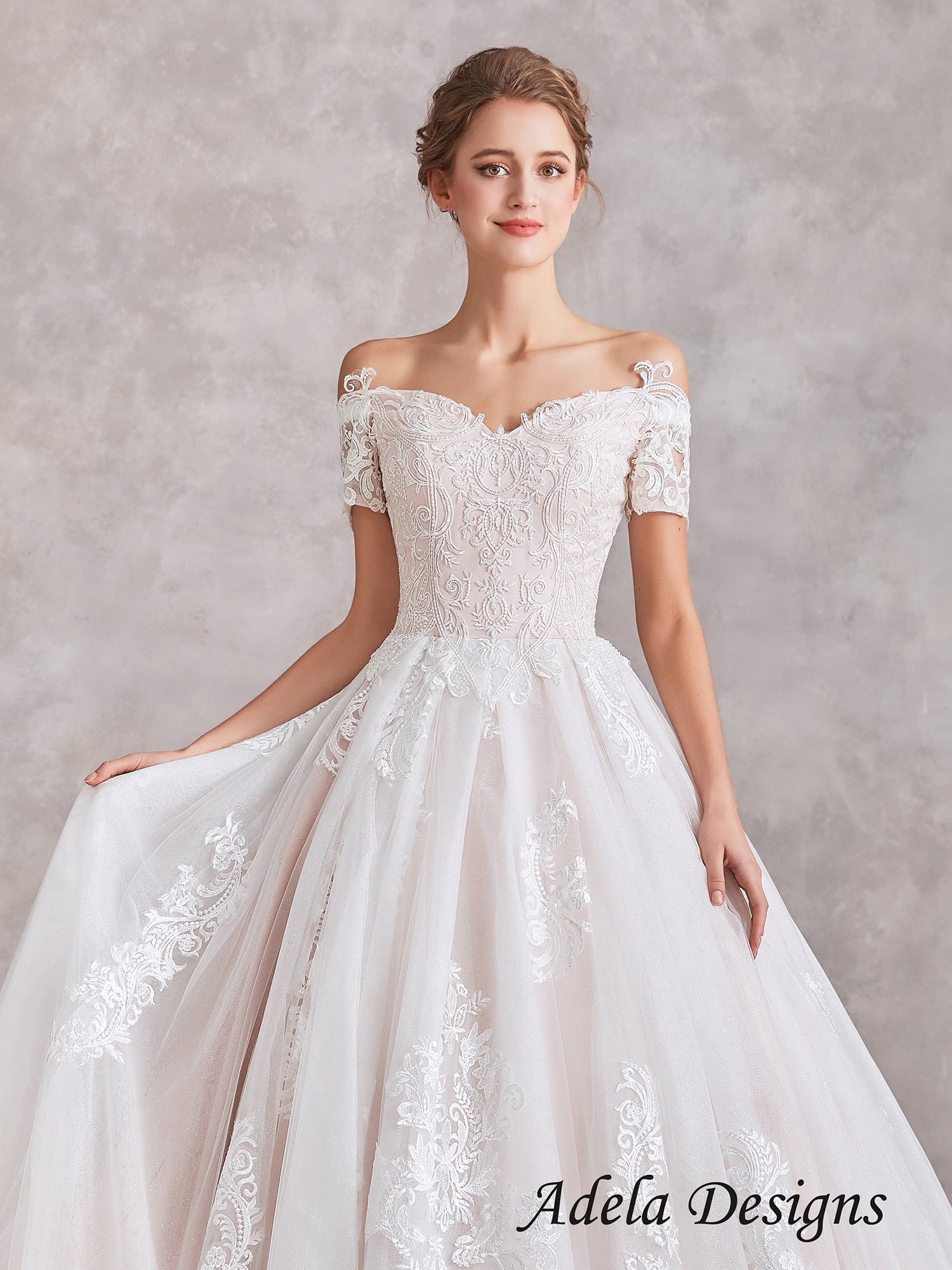 Adela Designs – A & M Enterprises Bridal